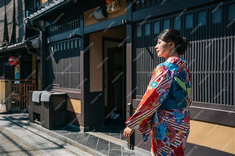 Premium Photo Young Girl Wearing Kimono For First Time And Joyfully