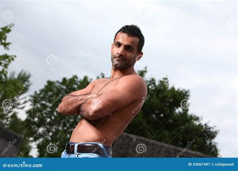 Handsome Man With A Beard Sitting Near The Trees Stock Image Image Of