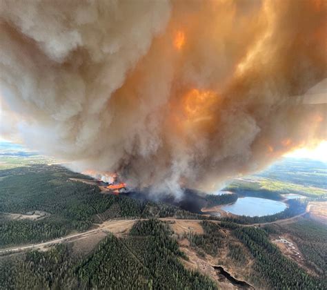 Satellite Images Capture Smoke From Out Of Control Wildfires In Alberta