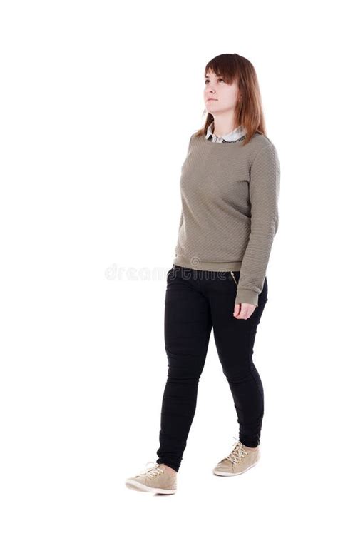 Back View Of Walking Woman Beautiful Blonde Girl In Motion Stock