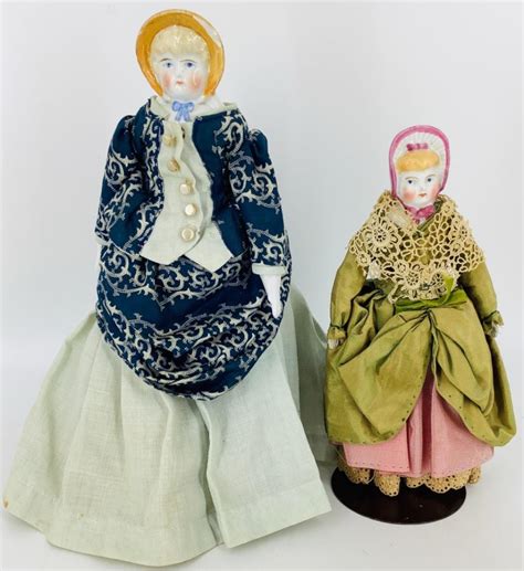 Lot 2 German China Head Dolls With Molded Bonnets 8 And 10½