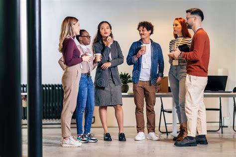 Diverse Colleagues Have Fun At Lunch Break In Office Smiling