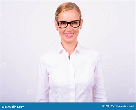 Portrait Of Happy Beautiful Blonde Businesswoman With Eyeglasses