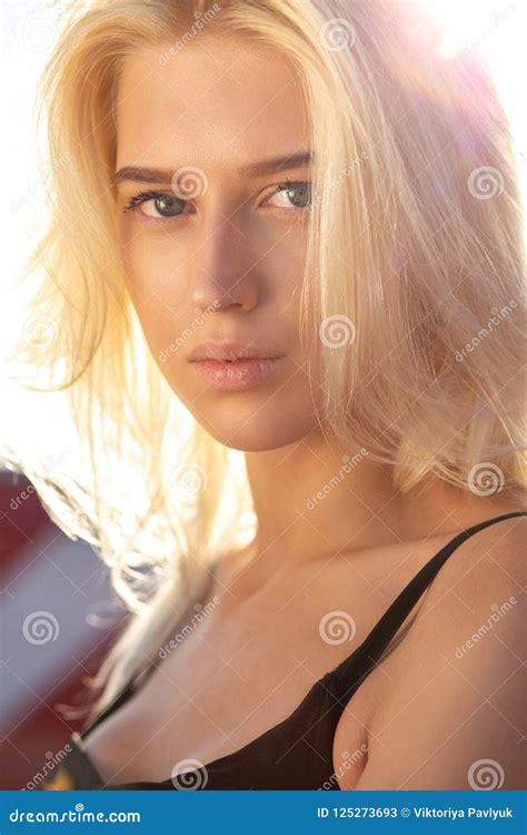 Tender Blonde Blue Eyed Model With Natural Makeup And Hair Look Stock