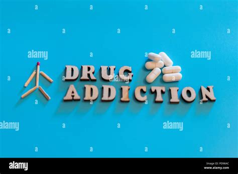 Drug Addiction Concept Human Figure Drugs Drug Addiction On A Blue