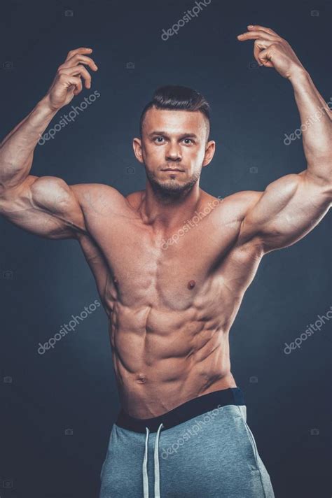 Strong Athletic Man Fitness Model Torso Showing Six Pack Abs Is Stock