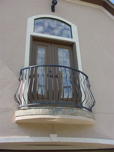 Custom Curved Iron Balcony House Of Forgings Stair And Railing Products