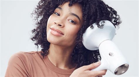 The 11 Best Hair Diffusers For Curly Hair According To Experts