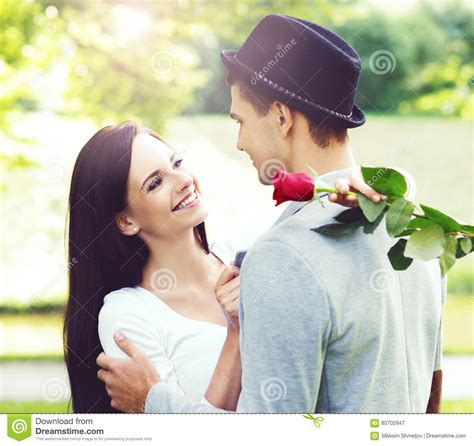 Young Beautiful Couple Of Hipsters Walking In The Park Stock Image
