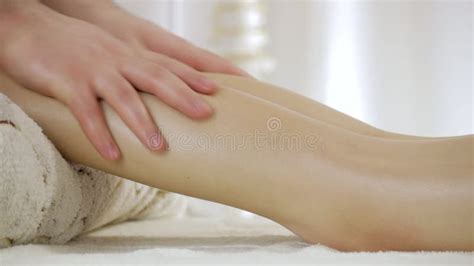 Doctor Massage Therapist Relieves Tension From Gastrocnemius Muscle Of