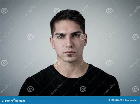 Portrait Of A Young Mixed Race Man With Angry Face Looking Furious