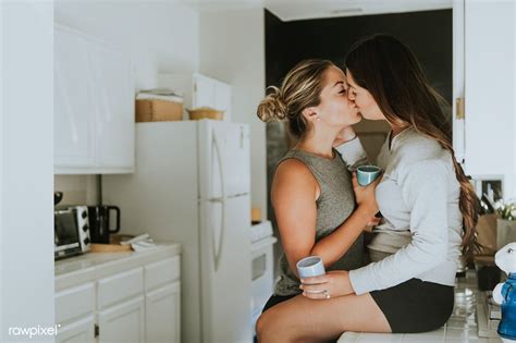 Lesbian Couple In The Kitchen Premium Image By