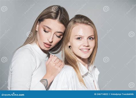 Portrait Of Two Cheerful Young Women Two Beautiful Young Women With