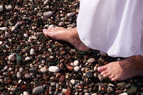 Womenand X27 S Feet In A Pareo Stand On Pebbles Relaxation And Stress