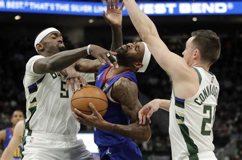 Nikola Jokic Nuggets Rout Defending Champ Bucks 136 100 Ap News