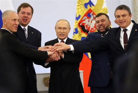 Putin Grants State Award To Russian Installed Governors Of Illegally