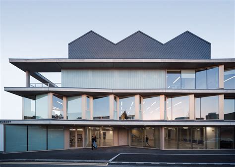 pitched roof pavilion sits on top of a london office building