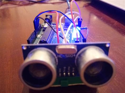 simple project with the ultrasonic sensor hc sr04 led arduino