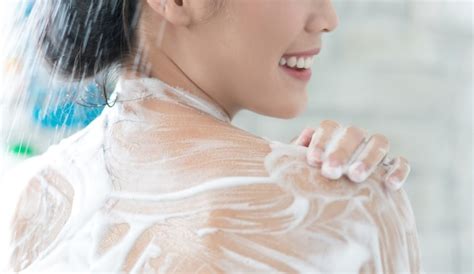Asian Women Are Taking A Shower In The Bathroom She Is Rubbing Soap She