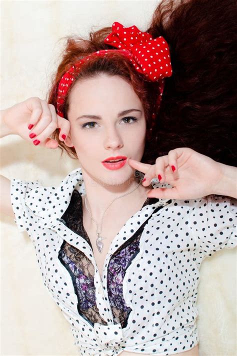 Portrait Of Tempting Beautiful Young Woman Pinup Girl On Her Knees In
