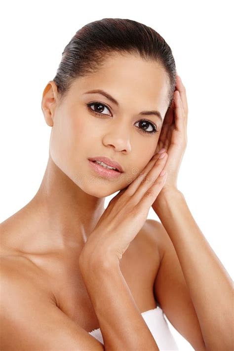 Graceful And Gorgeous Cropped Portrait Of A Beautiful Woman Touching