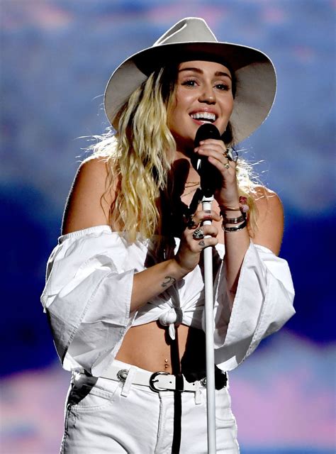 10 Celebrities You Totally Forgot Had Belly Button Piercings Miley