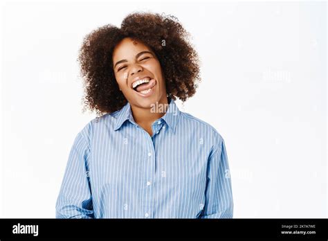 Positive African American Woman Shows Her White Healthy Smile