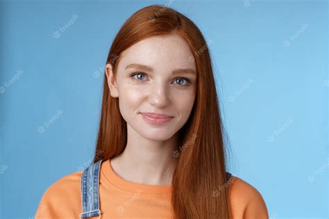 Premium Photo Outgoing Young Redhead Girl Blue Eyes Wearing Orange
