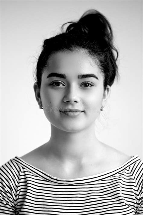 Portrait Of Young Beautiful Girl With Brown Eyes And Black Hair Natural