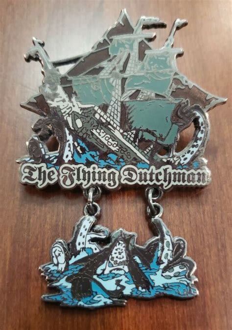 The Flying Dutchman Dangle Potc Pirates Of The Caribbean Pirate Ride