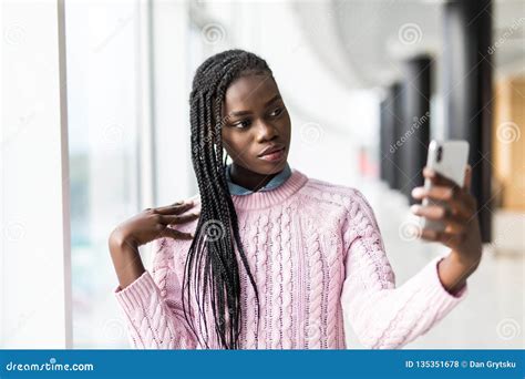 Young Beauty African Woman Take Selfie On Mobile Phone In Front Of
