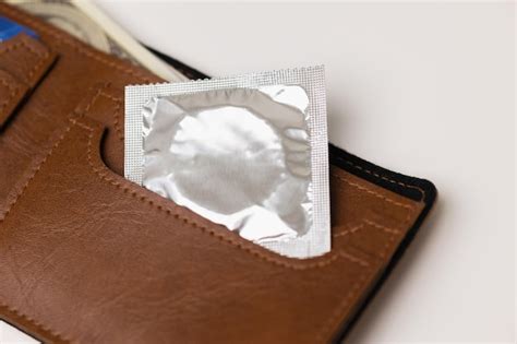 Premium Photo Condom In The Wall Ready To Use Anytime Anywhere