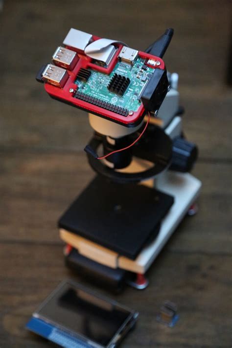 a low cost open source computer assisted microscope raspberry pi
