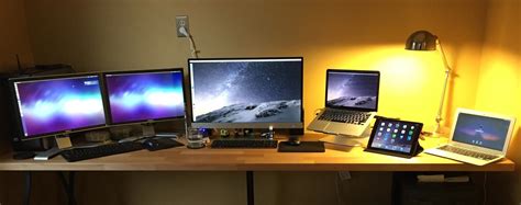 mac setup the mac and pc desk of an it consultant