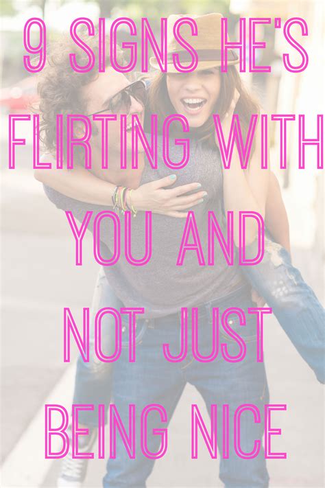 A Man And Woman Hugging Each Other With The Words 9 Signs Hes Flirting
