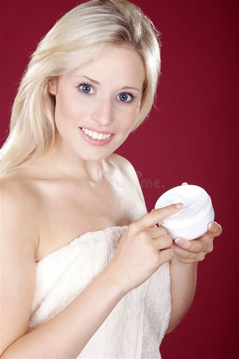 Beautiful Blond Model At Wellness Massage In Red And White Design Stock