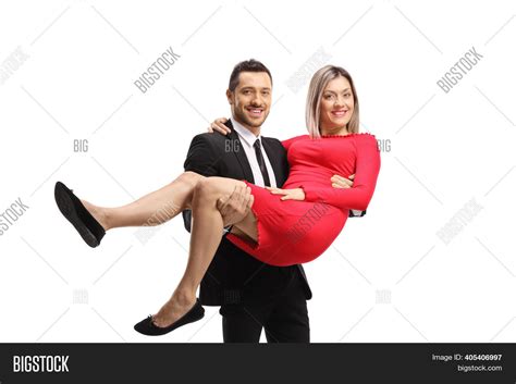 Guy Carrying Girl In Arms