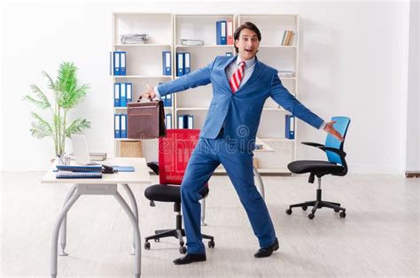 The Young Happy Male Employee In The Office Stock Image Image Of