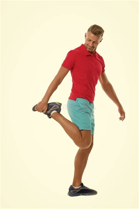 Warming Up With Some Stretches Athletic Man Stretching Isolated On