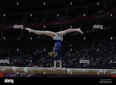Russian Gymnast Victoria Komova Performs On The Balance Beam In The