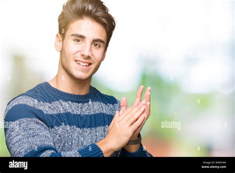 Young Handsome Man Over Isolated Background Clapping And Applauding