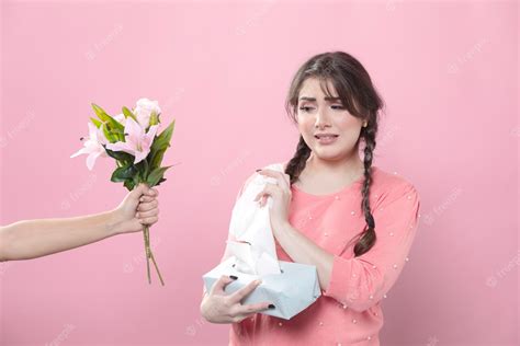 Free Photo Sad Woman Rejecting Flowers