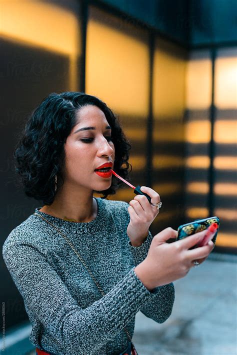 «hispanic Woman With Red Lips Del Colaborador De Stocksy «manu Prats