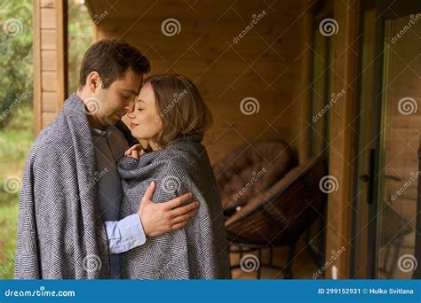 Lovely Romantic Couple Hugging While Standing On Porch Stock Image