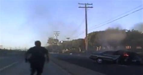 Watch Police Officer Pull Woman From Burning Vehicle