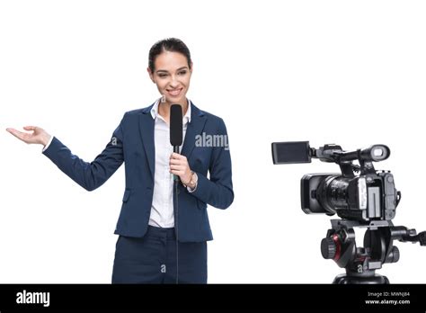 Beautiful Smiling Female Television Reporter With Microphone Looking At