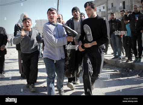 Aleppo Syria 1st Feb 2014 Syrians Carry A Dead Body Of A Man