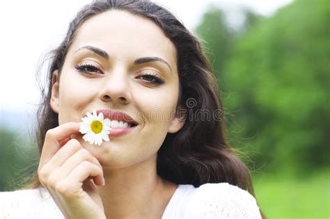 Happy Pretty Brunette Woman In Chamomile Field Cute Female Relaxed On