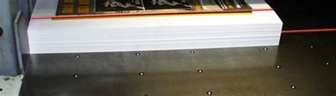 aligning paper stacks fort he punching machine z laser gmbh