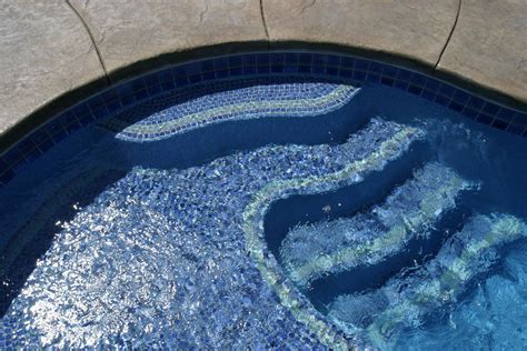 Learn How To Add Waterline Tile To Your Fiberglass Swimming Pool Or
